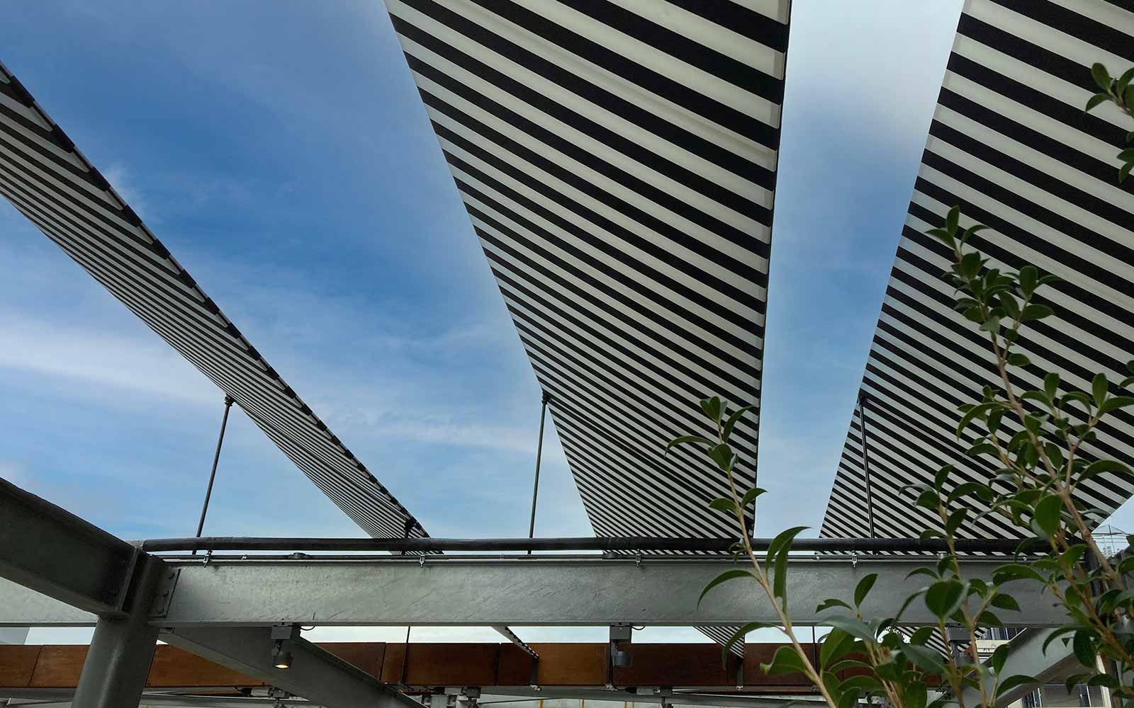 Bespoke panel shades at Store X - Deans Blinds